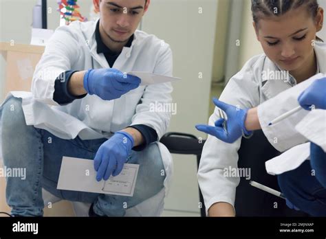 Criminological Expert Collecting Evidence At The Crime Scene Law And