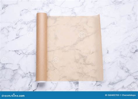 Roll Of Baking Paper On White Marble Table Top View Stock Image