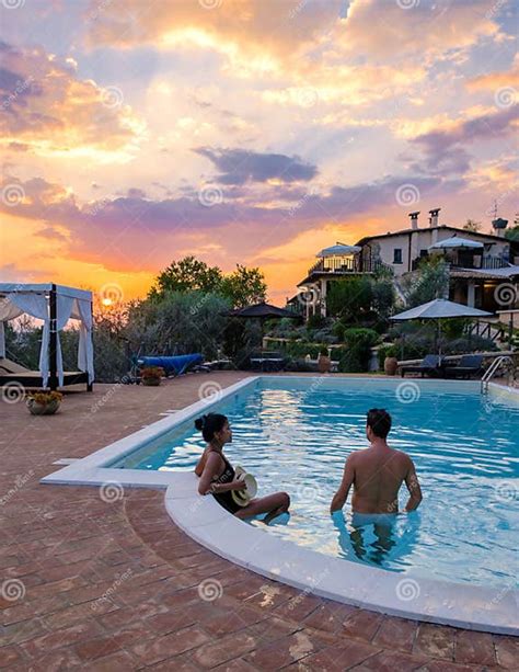 Couple On Vacation Luxury Country House Swimming Pool In Italy Pool