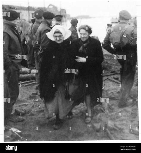 CASUALTIES AND SCENES AT BRESKENS A Helping Hand For An Old Dutch