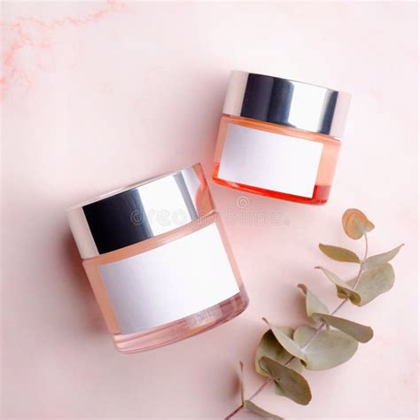 Cosmetic Cream Jars With White Labels And Eucalyptus Leaf On Pink Background Beauty Product