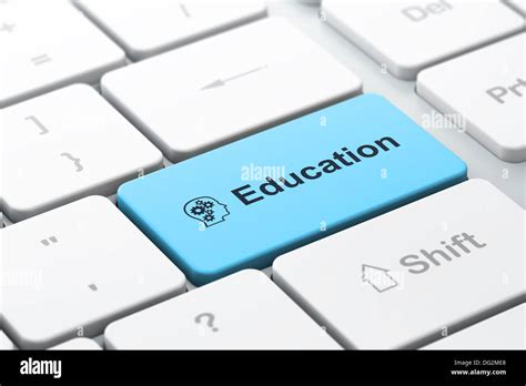 Education Concept Head With Gears And Education On Computer Key Stock
