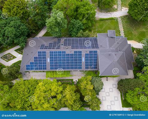 The Modern House With A Roof Designed As A Large Solar Panel Blending