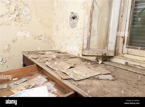 Office Desk And Documents In Abandoned Sanatorium Hospital Room Stock