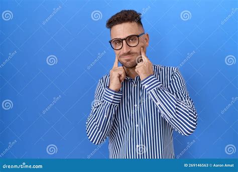 Hispanic Man With Beard Wearing Glasses Smiling With Open Mouth