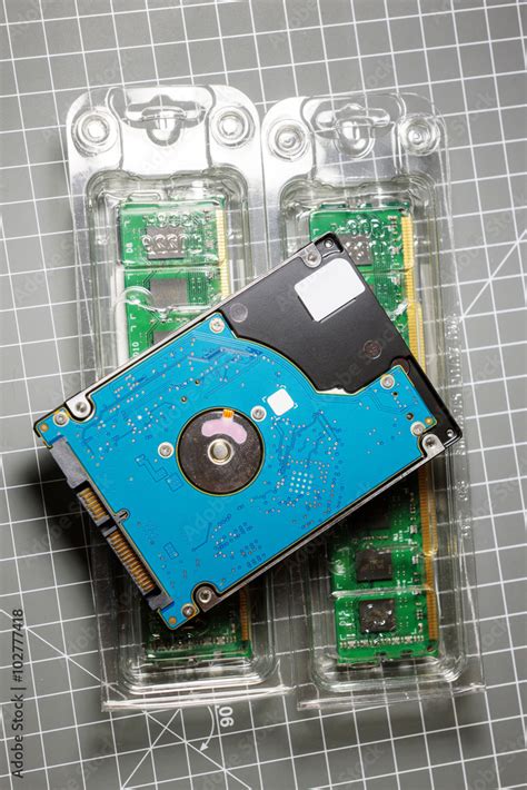 2 5 hdd hard disk drive on two ram random access memory sticks in