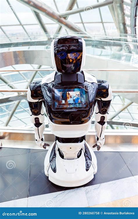 Robot In Full Growth In Museum Energy Of Future Glass Dome With Solar
