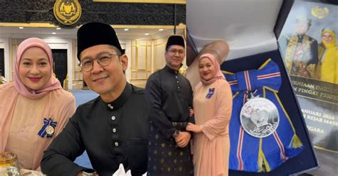 Isteri Dikurnia Pingat Pangkuan Negara Zarul Umbrella Syukur Simpan