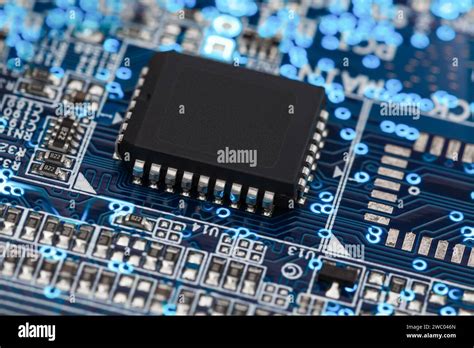 A Microprocessor On A Printed Circuit Board Surrounded By Auxiliary