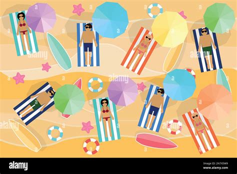 A People Sunbathe On The Beach In Summer Under Umbrellas On The Sea