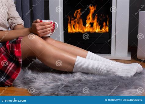 Cozy Winter Night Warmth And Serenity By The Fireplace Stock Image