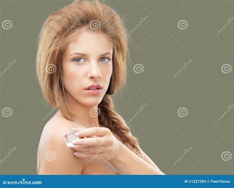 Young Woman Running Ince Cube On Shoulder Stock Image Image Of Blue
