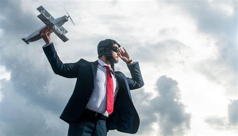 Premium Photo Business Launch Concept Businessman In Suit And Pilot