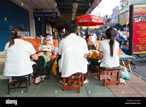 Enjoying A Traditional Thai Massage On Khaosan Road In Bangkok