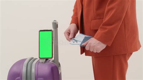 Businesswoman With Boarding Pass And Purple Suitcase Of Close Up Stock