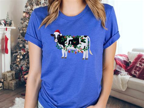 Funny Christmas Cow T Shirt Cow With Holly And Santa Hat Holiday