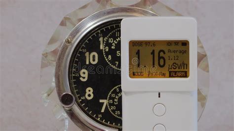 Measuring Radiation From Radioactive Old Clocks With A Dosimeter Radiometer Radium Isotope In