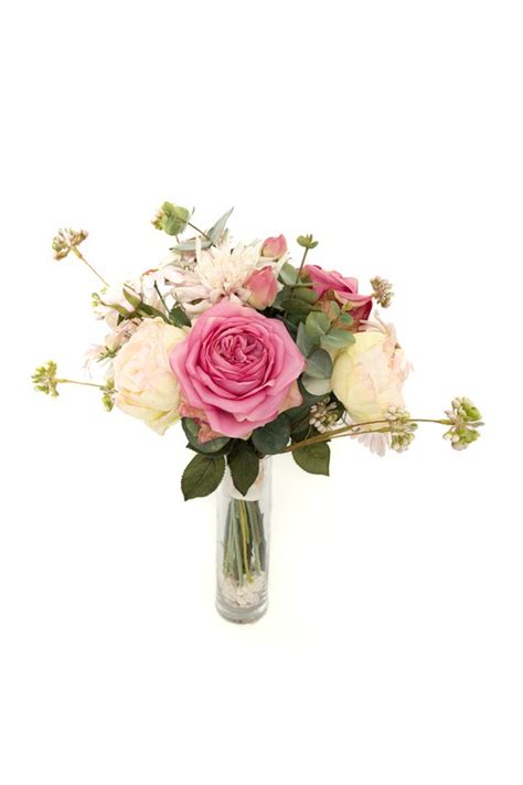 Délicat bouquet de fleurs artificielles avec roses et marguerites
