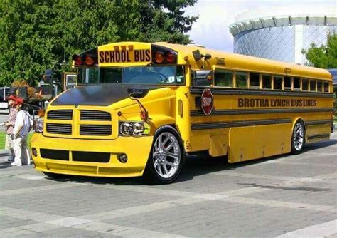Yellow School Bus Parked In Front Of A Building Exotische Autos