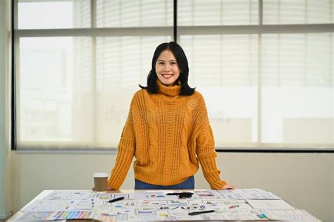 Portrait Of Web Developer Woman Working On App Design And User Interface At Workstation Stock