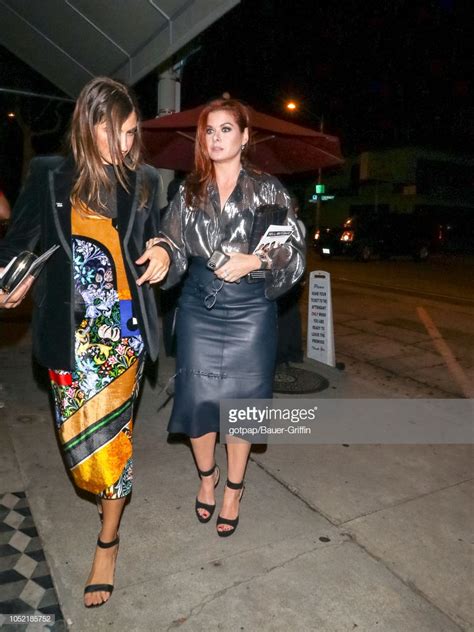 Ladies In Satin Blouses Debra Messing Gray Shiny Blouse And Leather Skirt