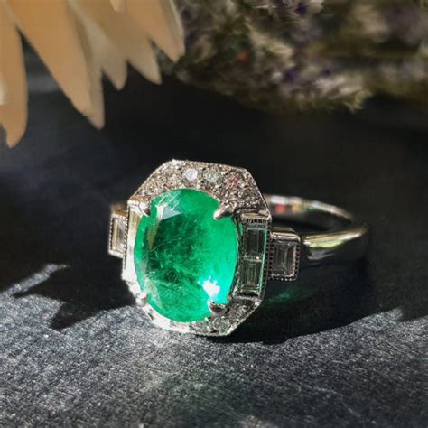 Contemporary Emerald And Diamond Cluster Ring