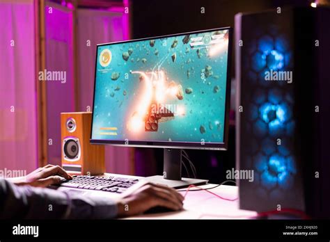 African American Man Playing Sf Space Videogame On Pc Screen Shooting Asteroids Gamer Enjoying