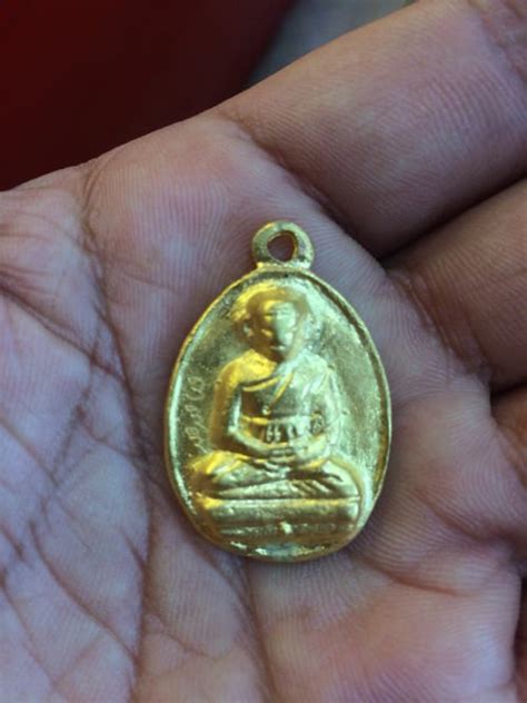 พระเกจิอาจารย์กรุงเทพเนื้อโลหะ เหรียญหล่อรูปไข่ หลวงพ่อไปล่ เนื้อทองคำ ปี2539 เลข399