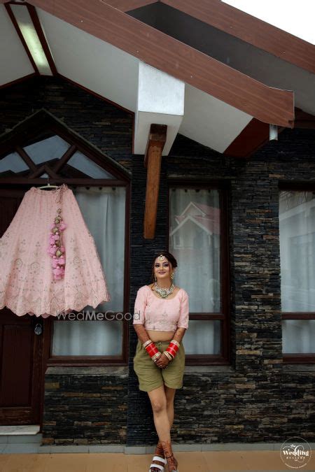 Photo Of Pastel Peach Lehenga With Gold Floral Motifs