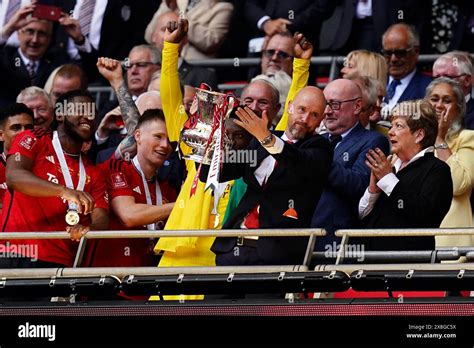 Manchester United Manager Erik Ten Hag Lifts The Fa Cup Trophy After