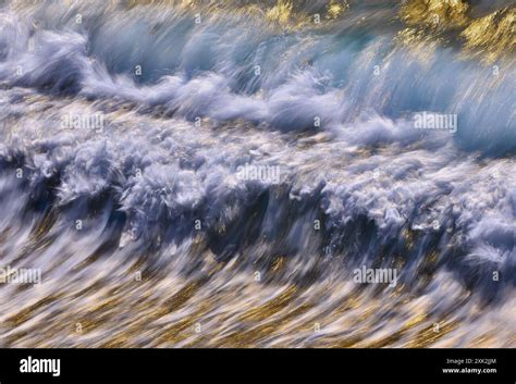 Artistic Capture Of Waves Using A Slow Shutter Speed To Emphasize The