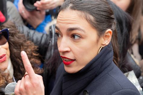 Ai Generated Pixelated Photo Of Aoc In A Bikini Pulled From Paper Highlighting Danger Of Ai