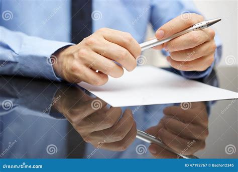 Closeup Of Business Man Reading Document Or Contract Stock Image
