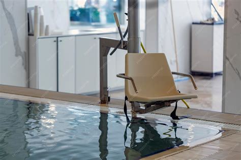 Premium Photo Equipment For The Descent Into The Water Pool Elevator