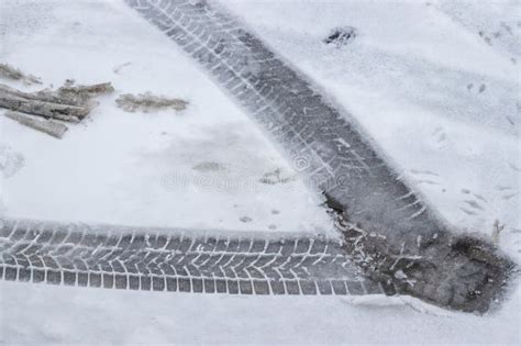 Wheel Track On Fresh Snow Wheel Tracks On The Road Covered With Snow