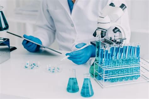 Premium Photo Microscope With Lab Glassware Science Laboratory