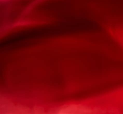 빨간색 추상 미술 배경 실크 질감과 고전적인 고급 디자인을 위한 물결선 프리미엄 사진