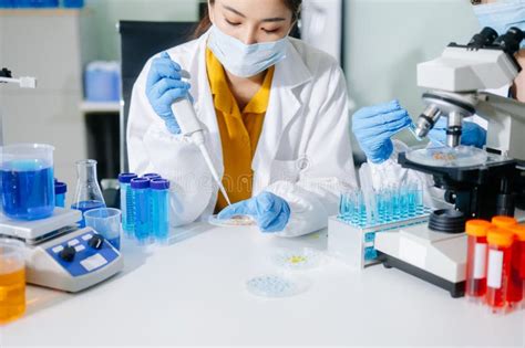 Scientists Beakers And Microscopes In Cutting Edge Research Perfect For Science And