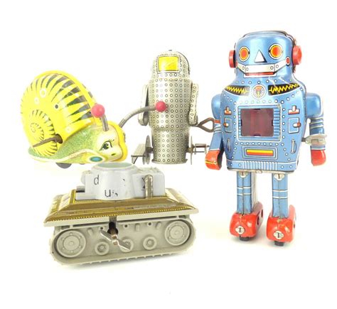 Lot 214 Four Vintage Tinplate Clockwork Toys