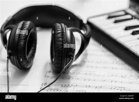 Headphones On Musical Synthesizer Keyboard Headphones On Electronic Piano Musical Background