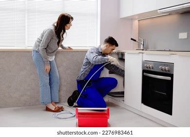 Plumber Cleaning Pipe Drain Clog Unclog Stock Photo Shutterstock