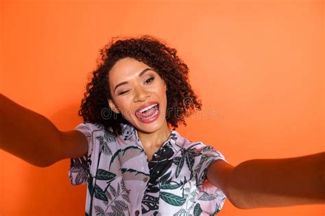 Photo Of Cheerful Carefree Girl Wink Lick Tongue Recording Selfie