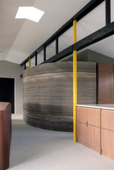 Arg Architects Updates Gridded Home In Iceland With Curving Walls