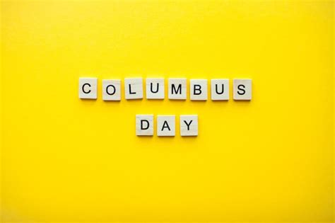 Premium Photo The Inscription Columbus Day From Wooden Blocks On A