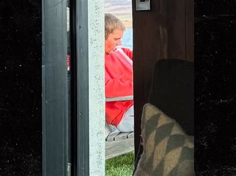 Justin Bieber Photographed Taking A Hit Off What Appears To Be A Bong