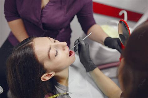 Beautiful Girl Sitting In The Dentist S Office Oral Human Treatment