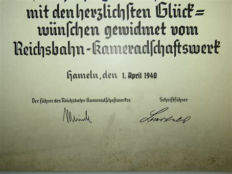 A Set Of Award Documents For A Railway Official Of The Third Reich