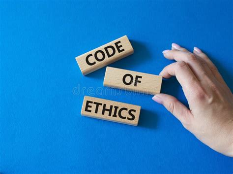 Code Of Ethics Symbol Concept Words Code Of Ethics On Wooden Blocks Beautiful Blue Background