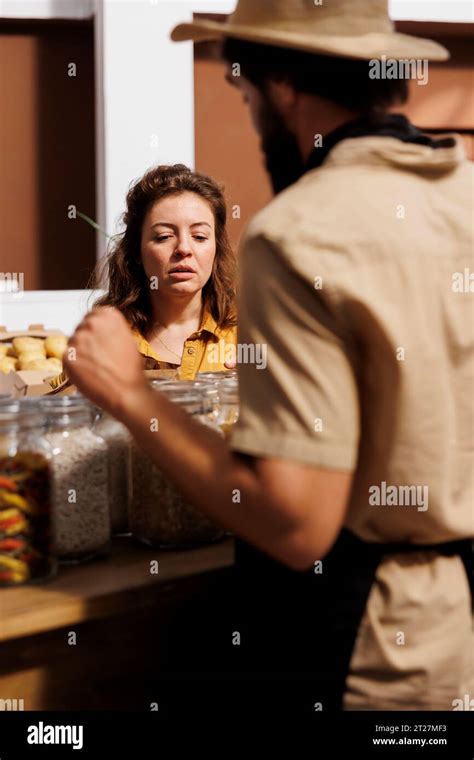 Client Shopping For Pantry Staples In Environmentally Friendly Zero