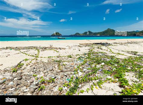 Plastic Rubbish Spoiling A Lovely White Sand Beach At Mahoro Paradise